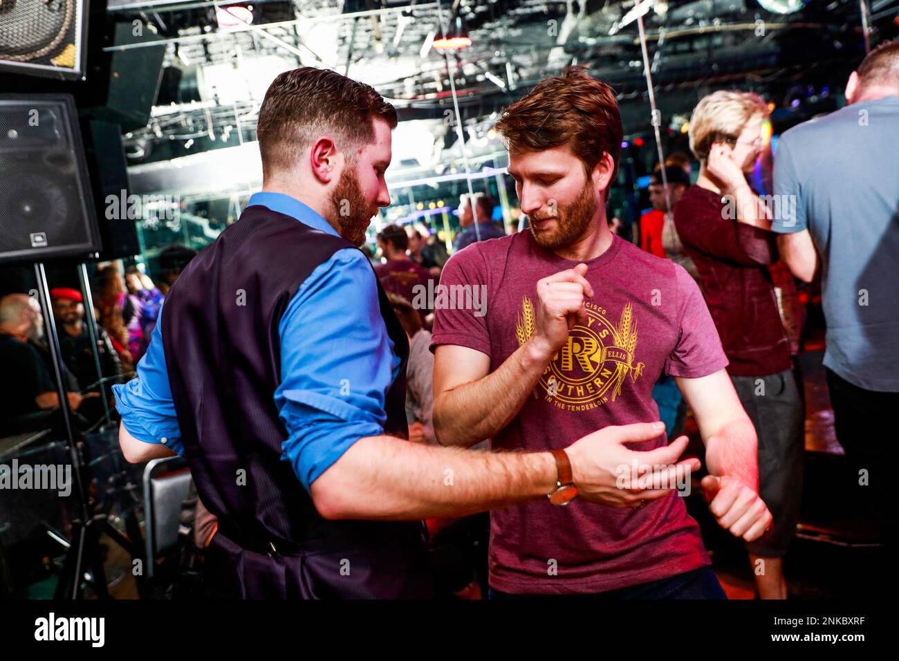 (l-r) Peter Stevens and Lucian Sweitzer dance at Divas bar in San ...