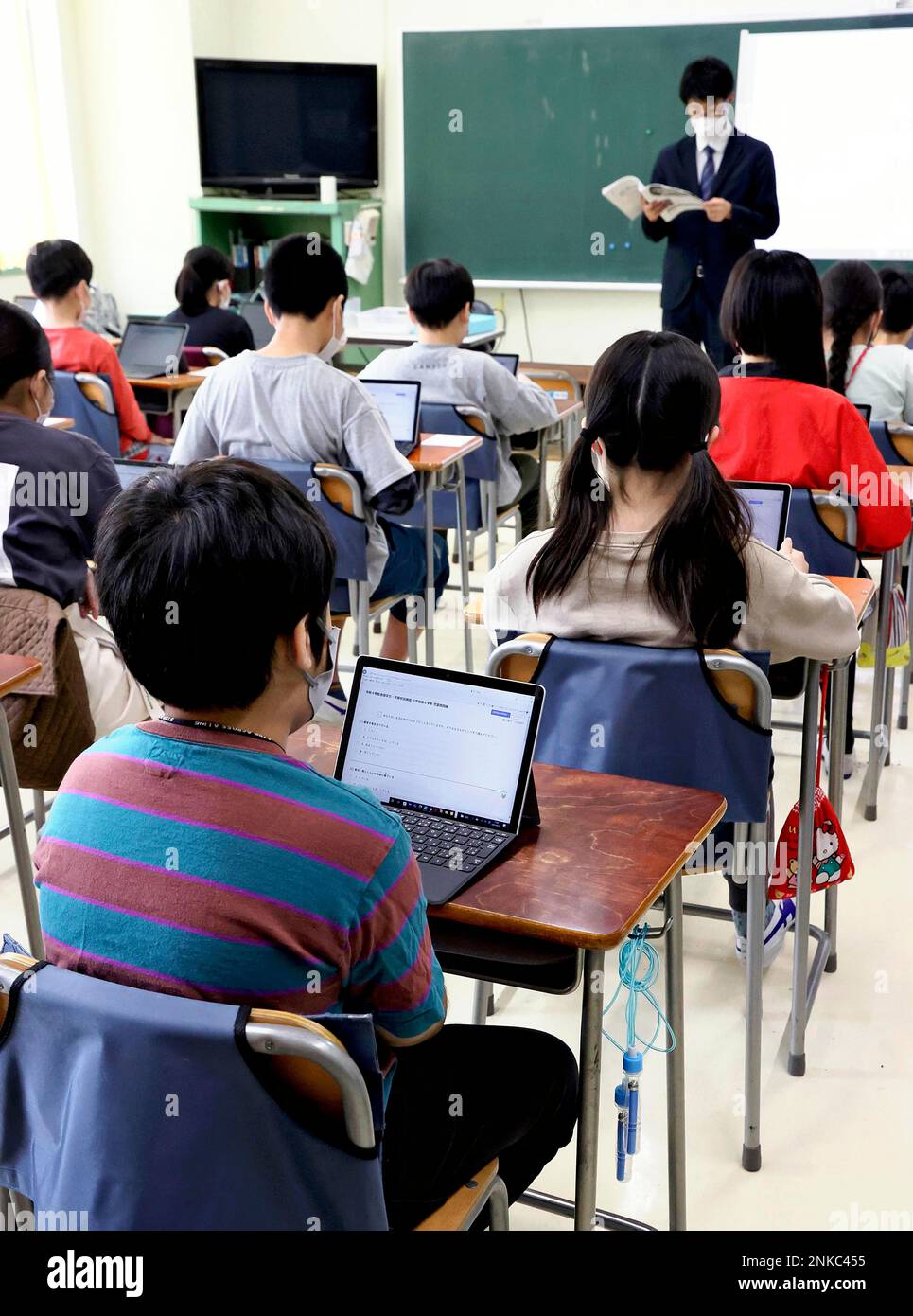 Students using PC attend the national achievement tests at an ...