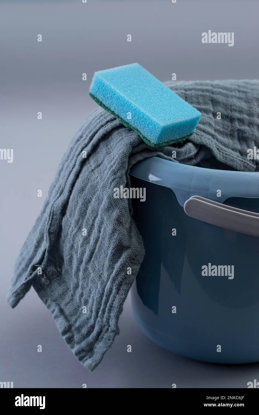Cleaning bucket with cleaning cloth, cleaning sponge Stock Photo - Alamy
