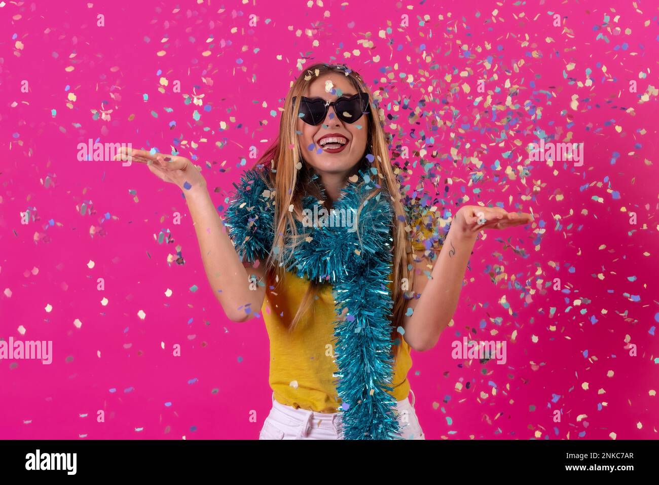 Girl throwing confetti hi-res stock photography and images - Alamy