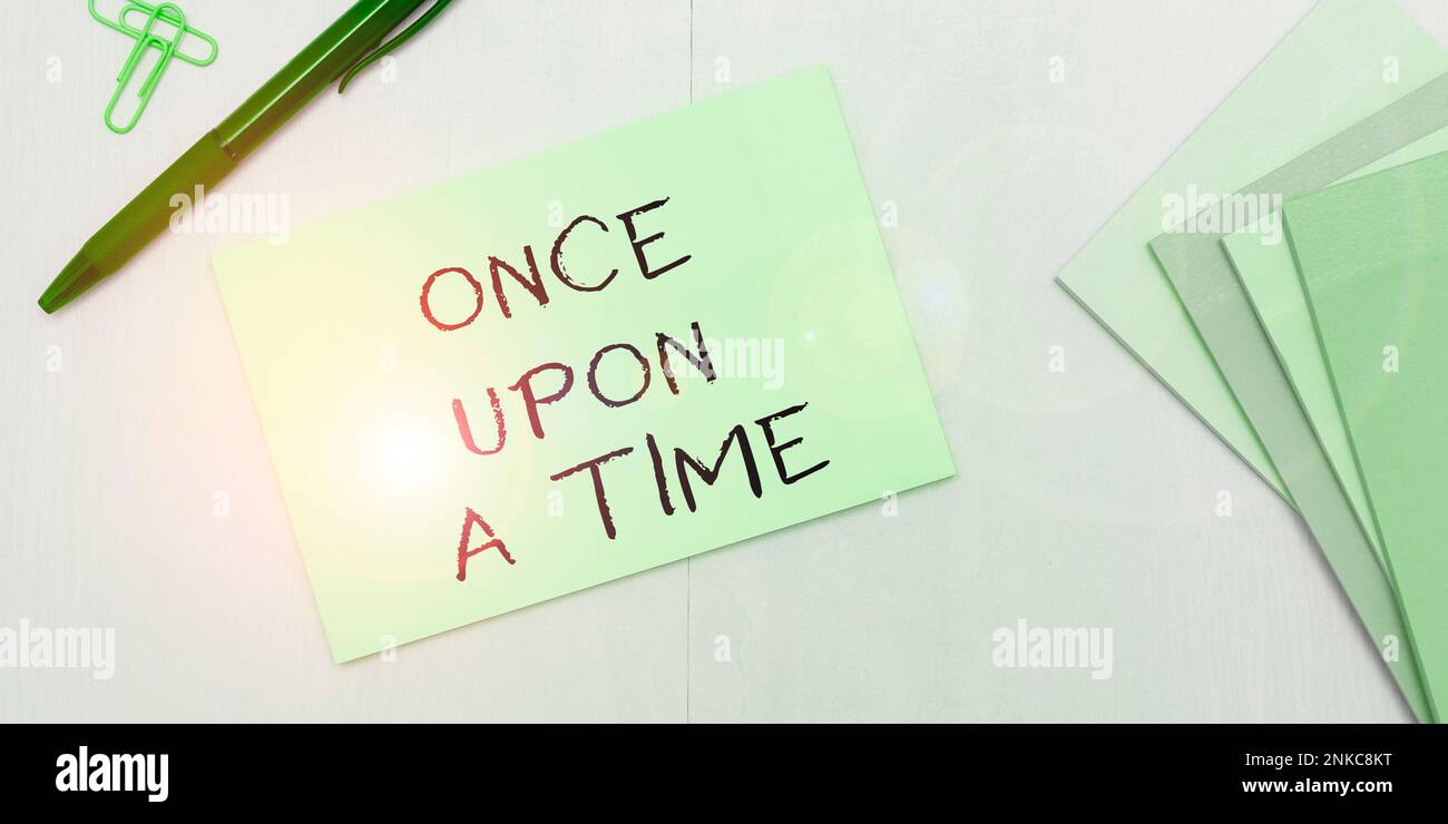 Hand writing sign Once Upon A Time. Word for telling story Fairytale ...