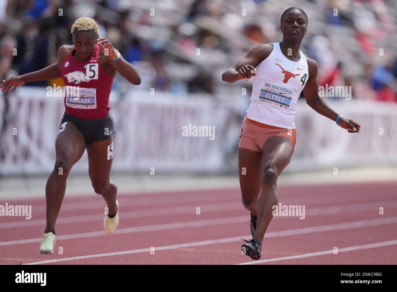 Julien Alfred of Texas (right) defeats Jada Baylark of Arkansas to win ...