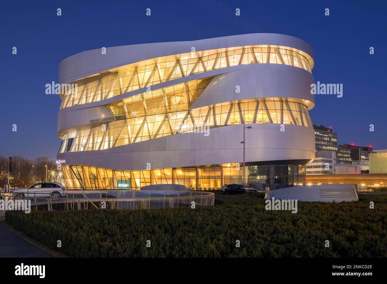 Mercedes-Benz Museum, in the evening, illuminated, modern architecture ...