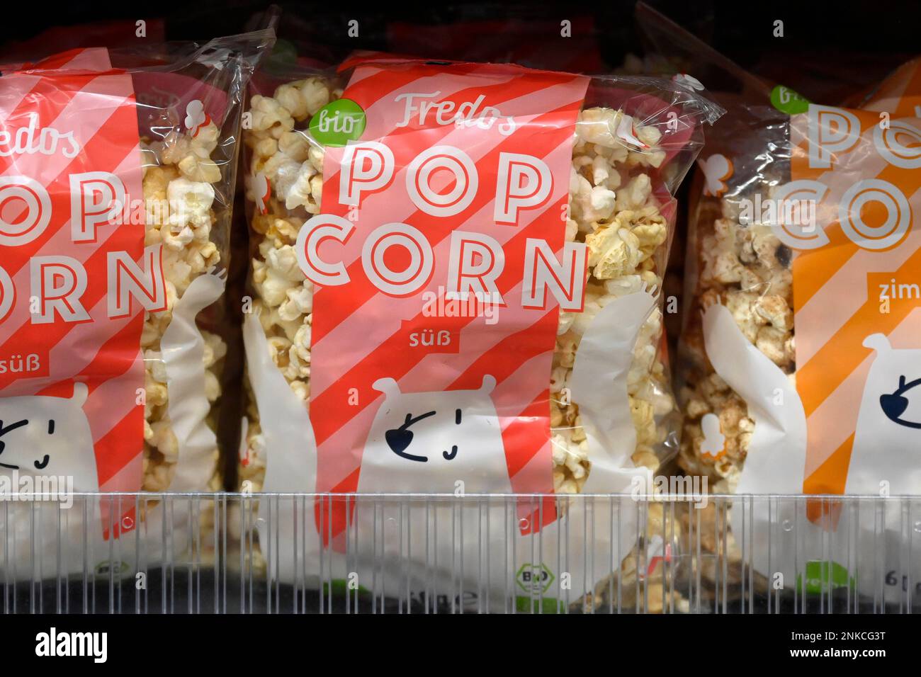 Popcorn display shelf Stock Photo - Alamy