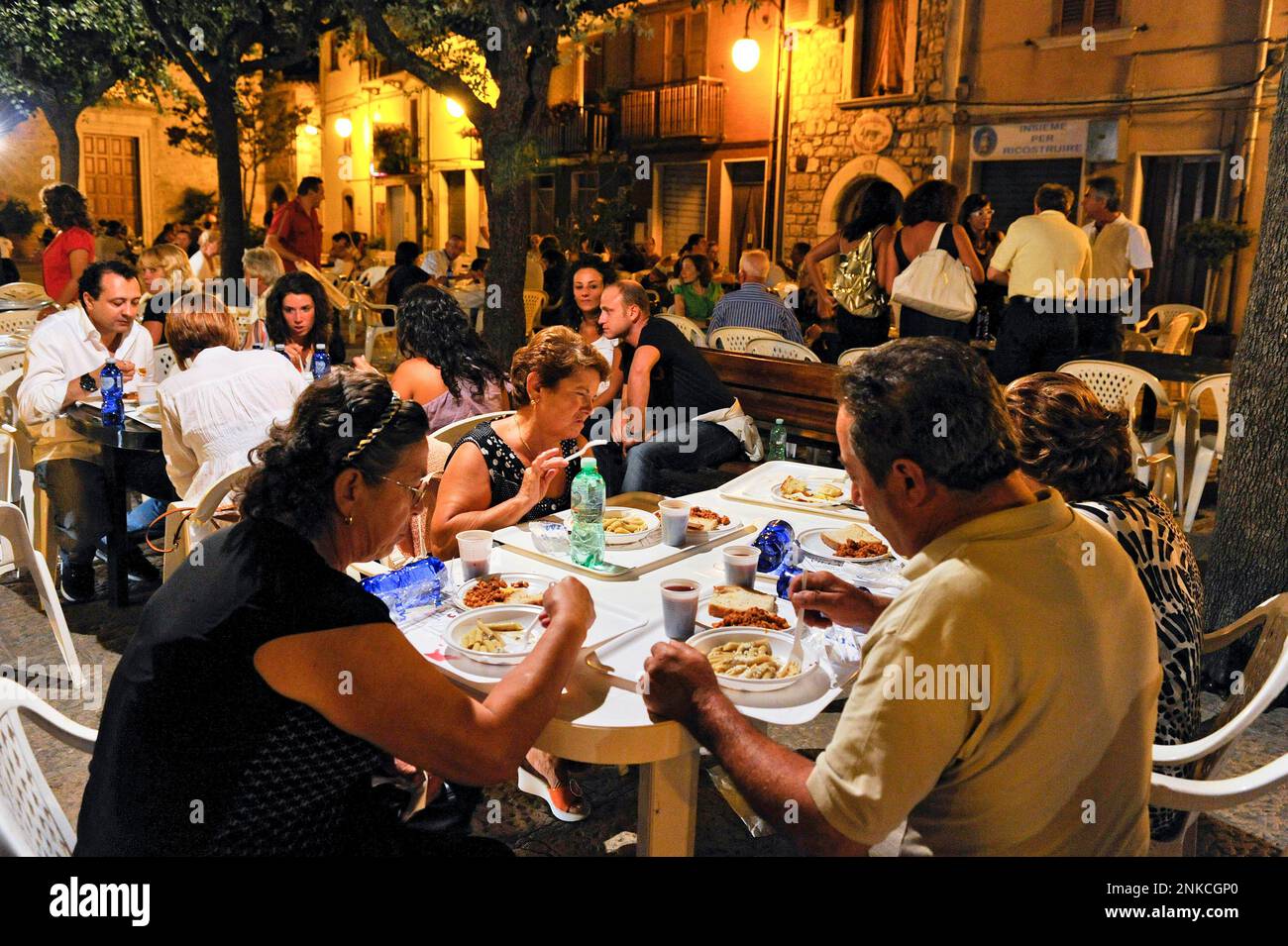 Eating pasta together, town festival, town square, Trivento, Molise ...