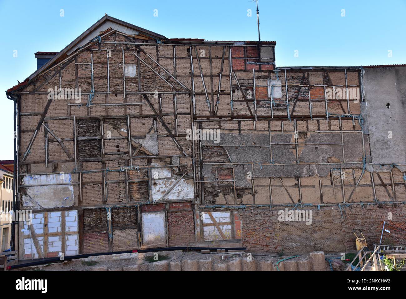 Half-timbered building behind the facade, visible when the neighbouring ...
