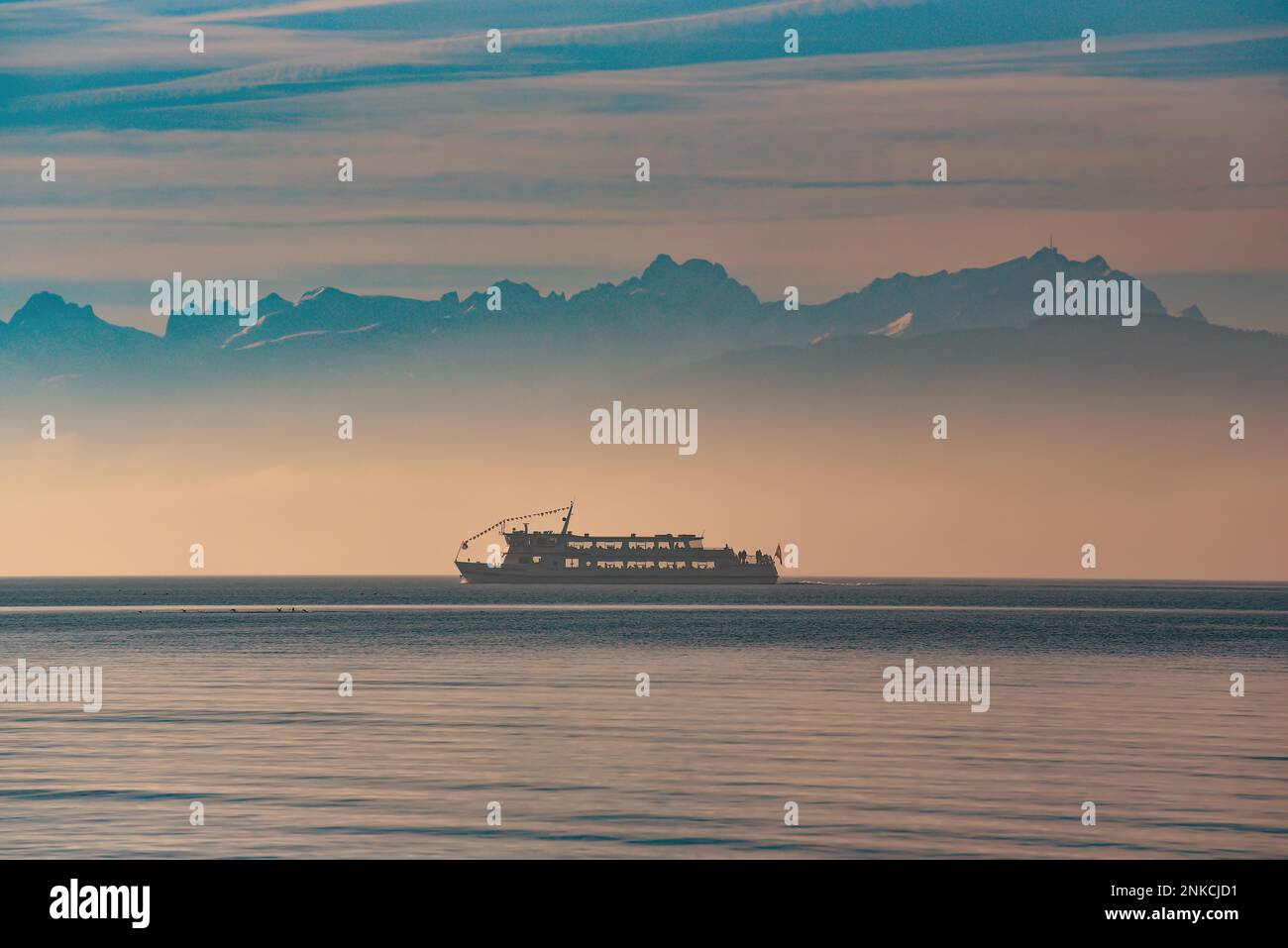 Passenger ship on Lake Constance, in the background the Swiss mountains ...