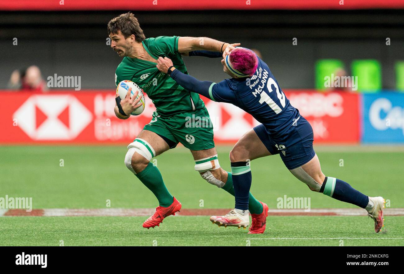 Scotland's Ross McCann (12) tries to tackle Ireland's Harry McNulty ...
