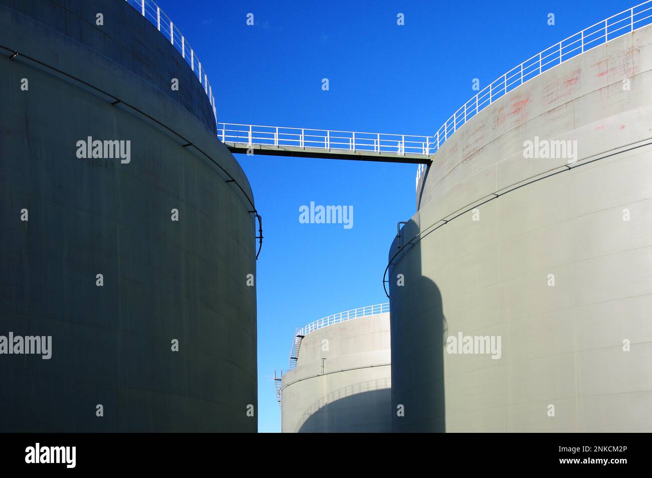 Bridge, tank farm for mineral oil Stock Photo - Alamy