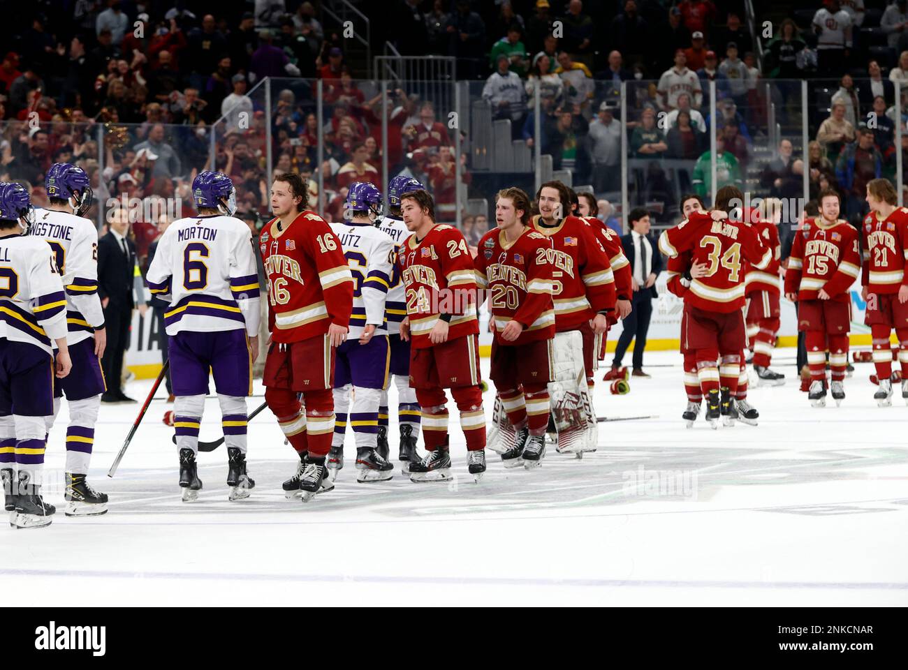 BOSTON, MA - APRIL 09: Denver and Minnesota State shake hands after the NCAA Frozen Four final ...