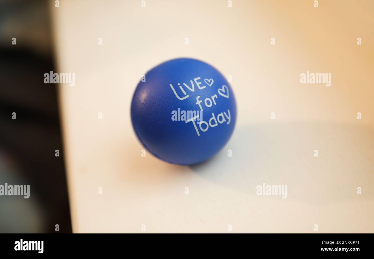 Stress Ball showing daily motivational messages stress less Stock Photo ...