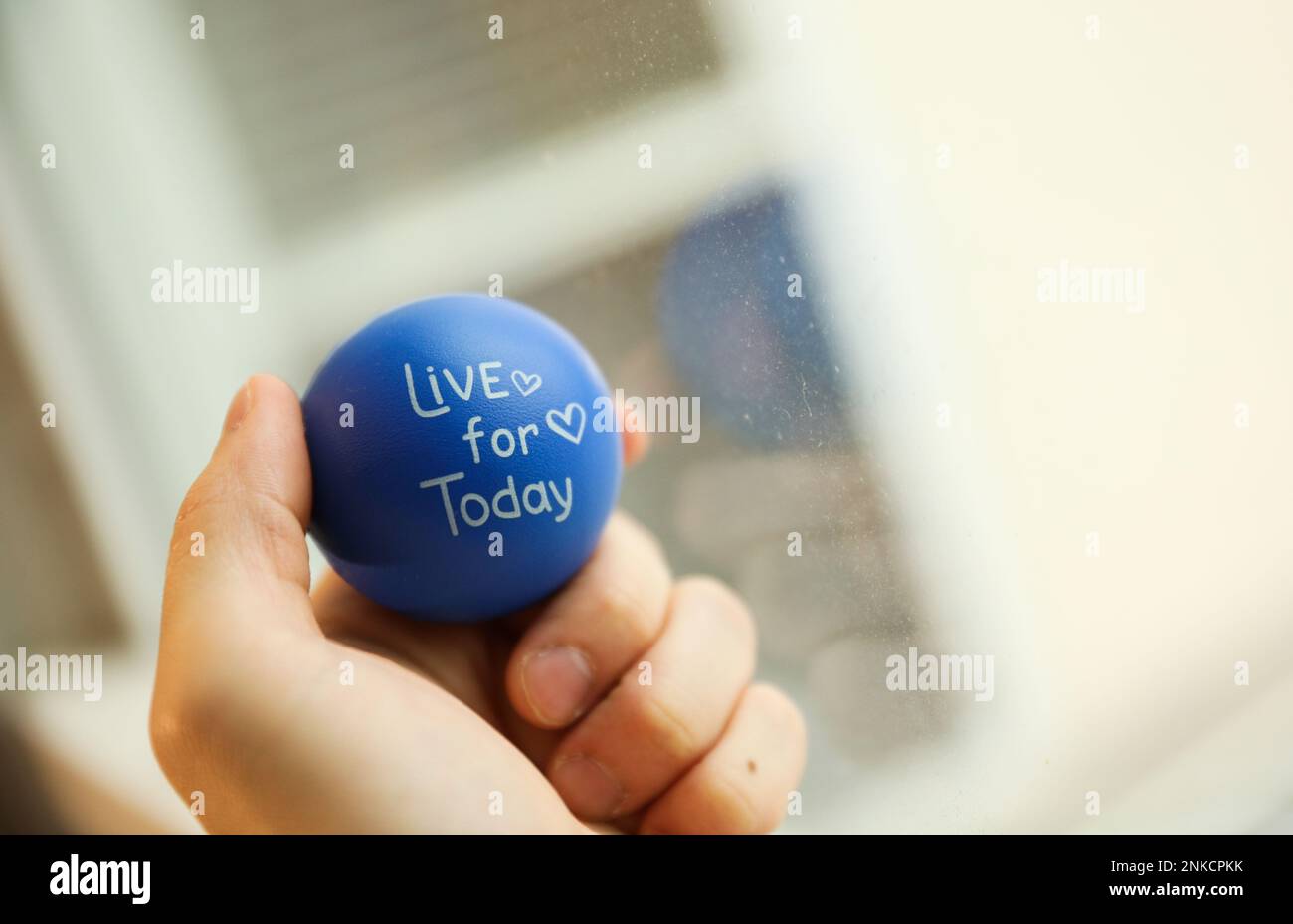 Stress Ball showing daily motivational messages stress less Stock Photo ...