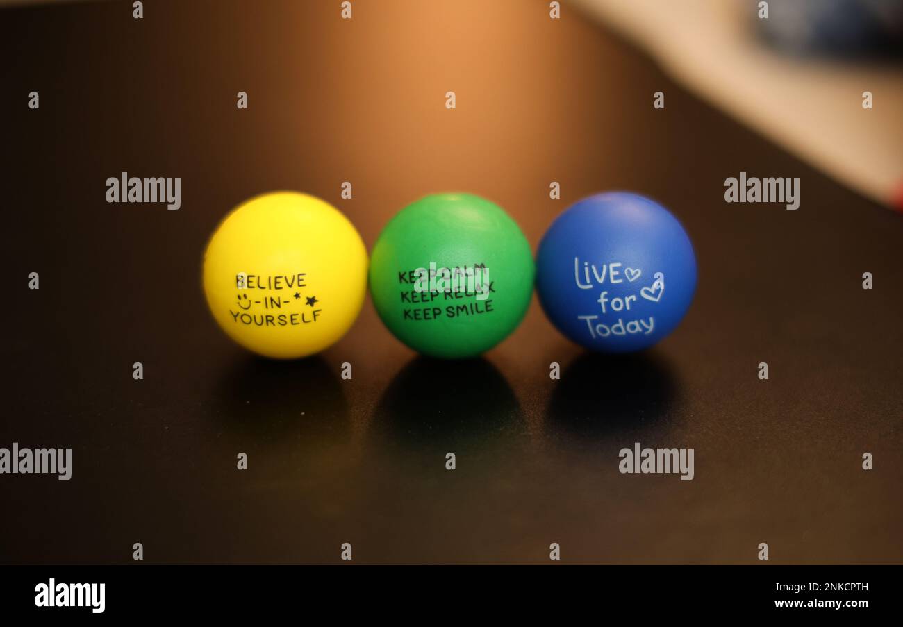 Stress Ball showing daily motivational messages stress less Stock Photo ...