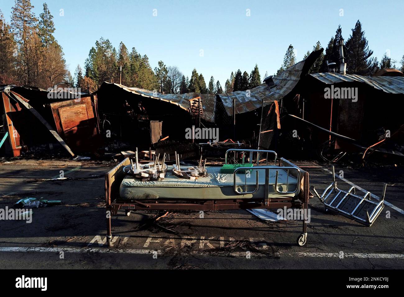 A bed rests in the parking lot of Cypress Meadows Post-Acute, a nursing ...