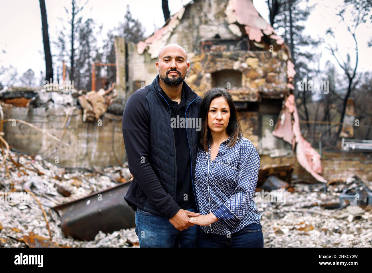 David Rivera and wife Chenoa Rivera pose for a portrait on one of their ...