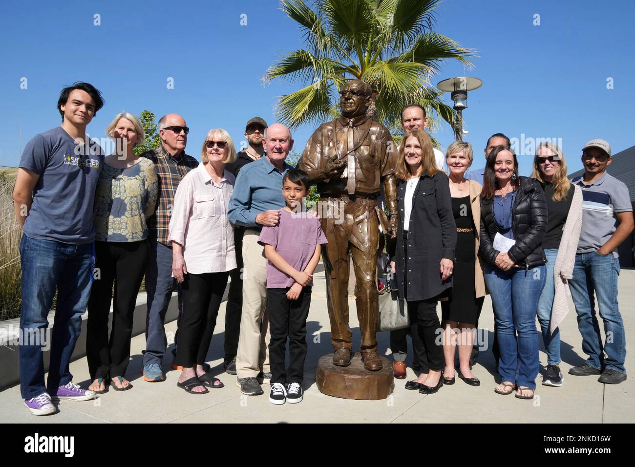 Hilmer Lodge family members pose with statue of the former Mt. San ...