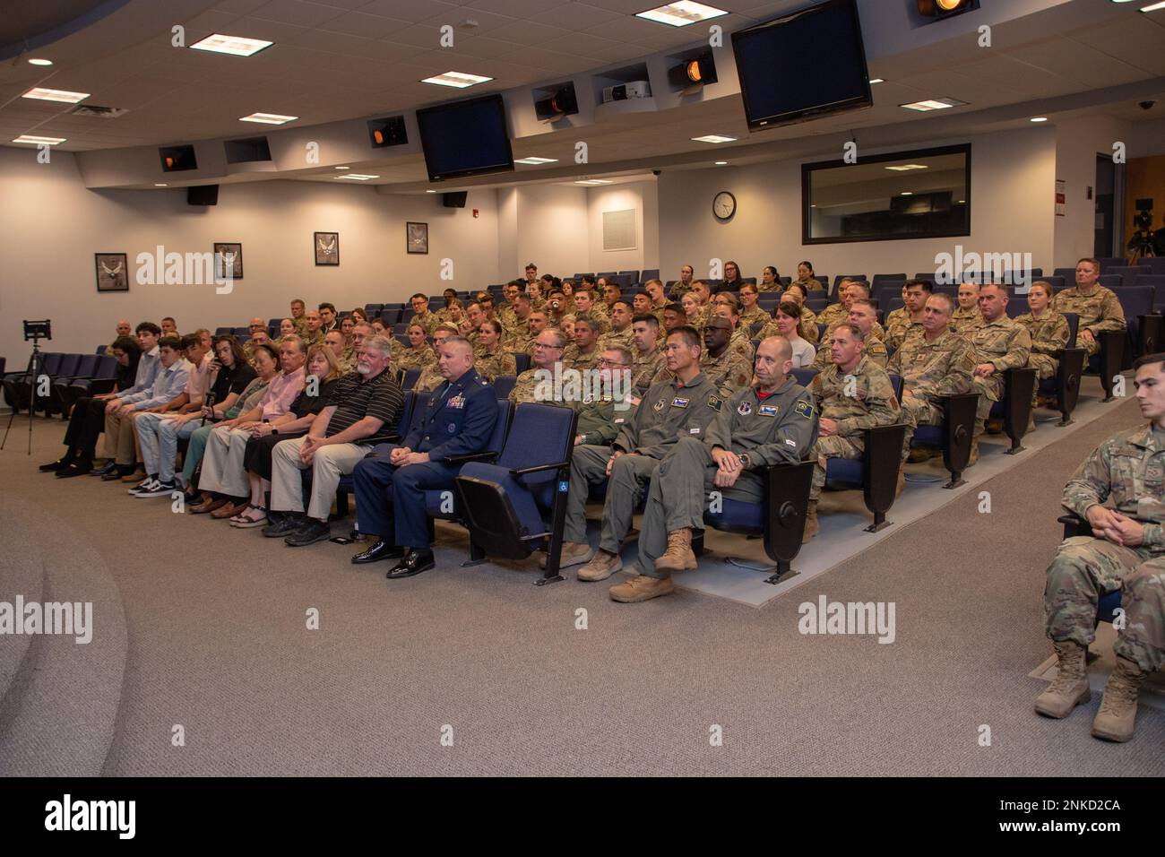 Friends and family watch the promotion of Lt. Col. Eric Stringer, the ...