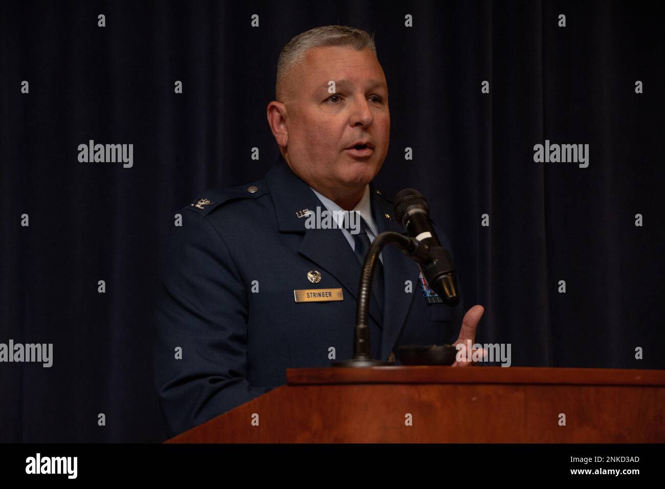 Col. Eric Stringer, 152nd Medical group Commander, speaks to his family ...