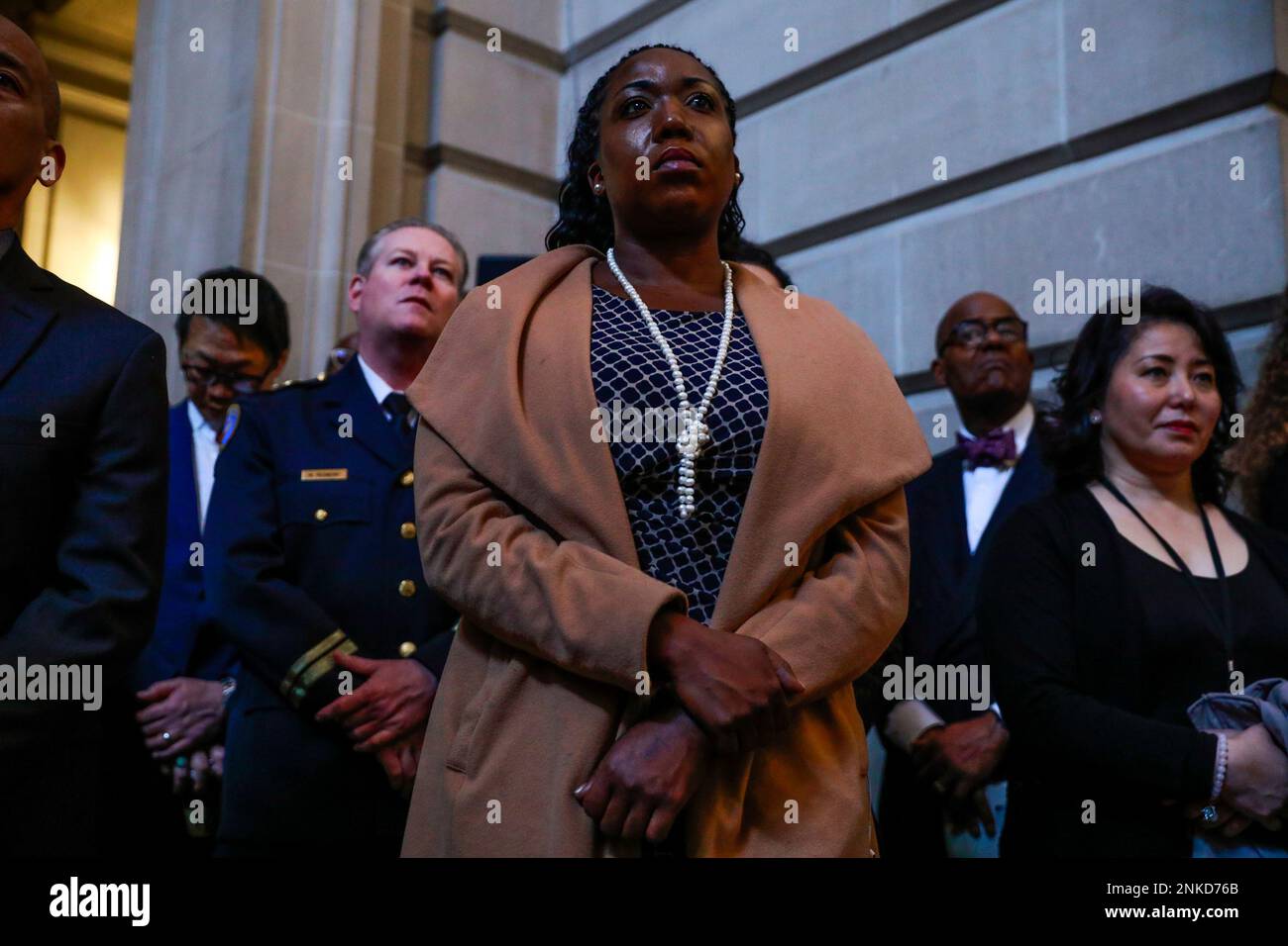 People listen during Public Defender Jeff Adachi's memorial service at City Hall in San ...