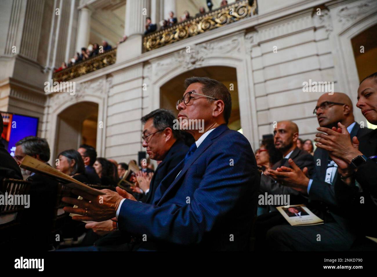 People clap during Public Defender Jeff Adachi's memorial service at ...