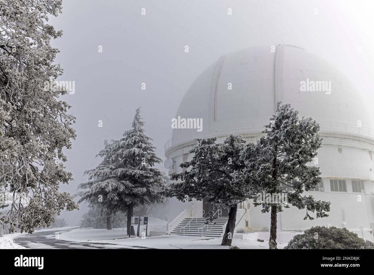 A layer of snow and ice is seen outside the 120-inch telescope ...