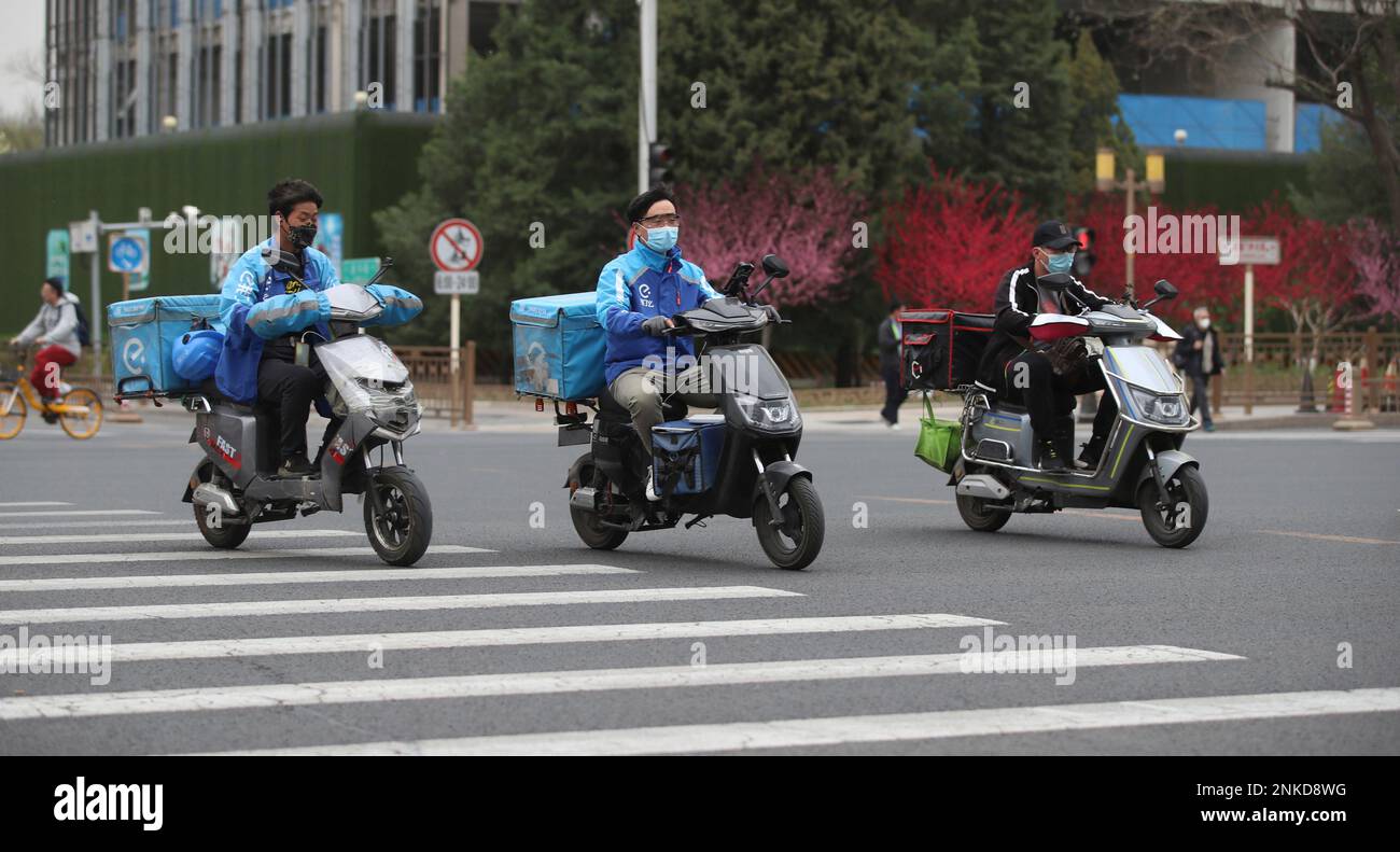Staffs of Eleme ride bikes in Beijing, China on April 12, 2022. Eleme ...