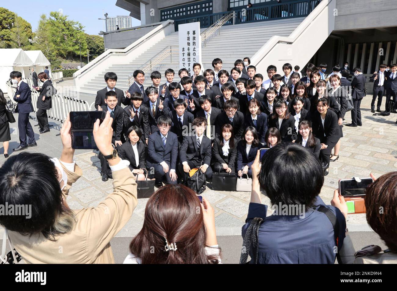 Freshmen pose for a photo ahead of the entrance ceremony of the ...