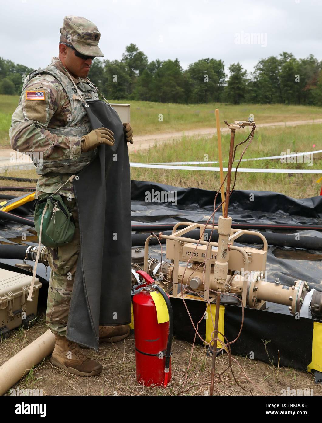 U.S. Army Reserve Spc. Paul Romero, a petroleum supply specialist ...