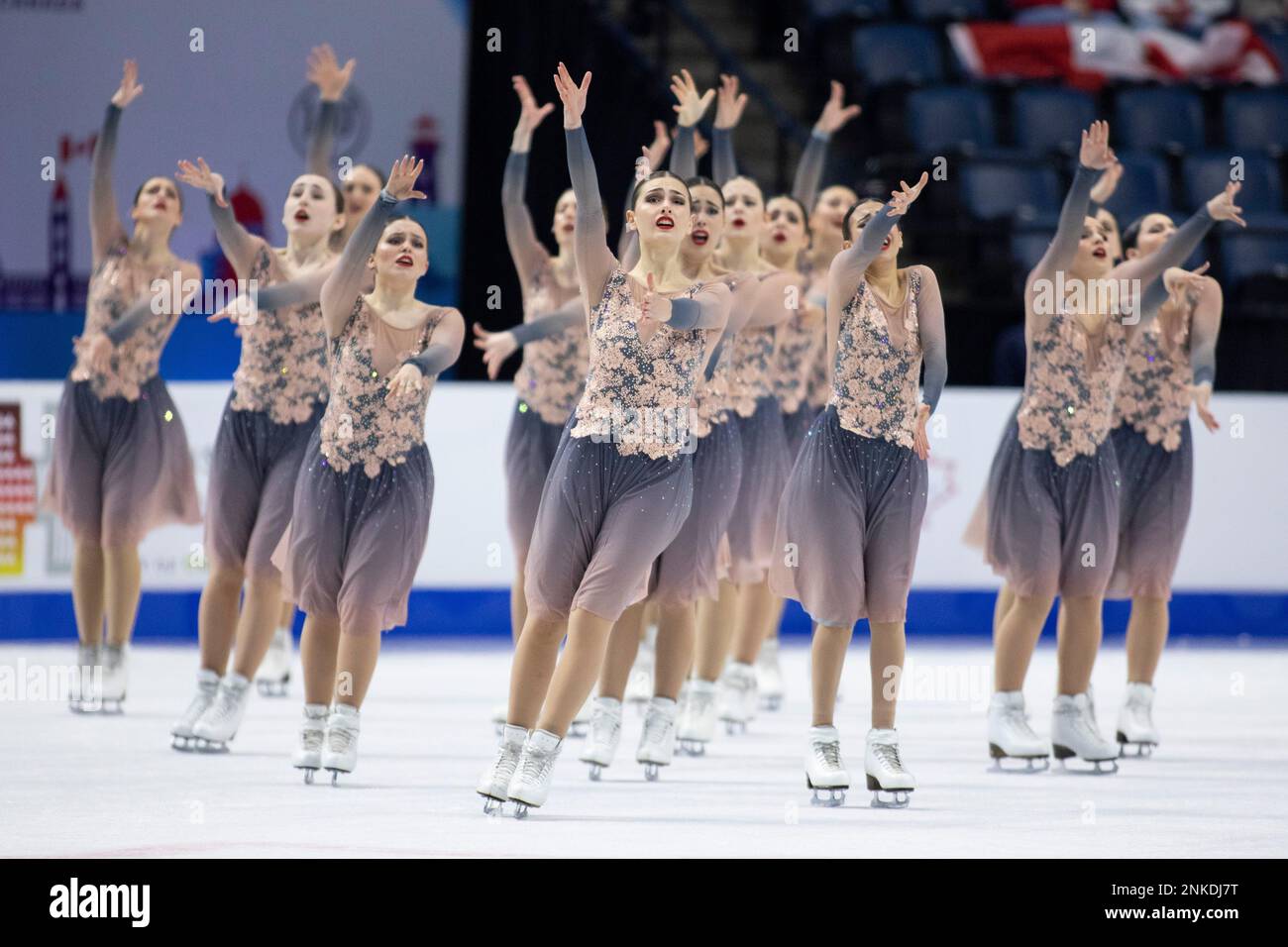 Members of Team Hot Shivers from Italy compete in the free skate during ...