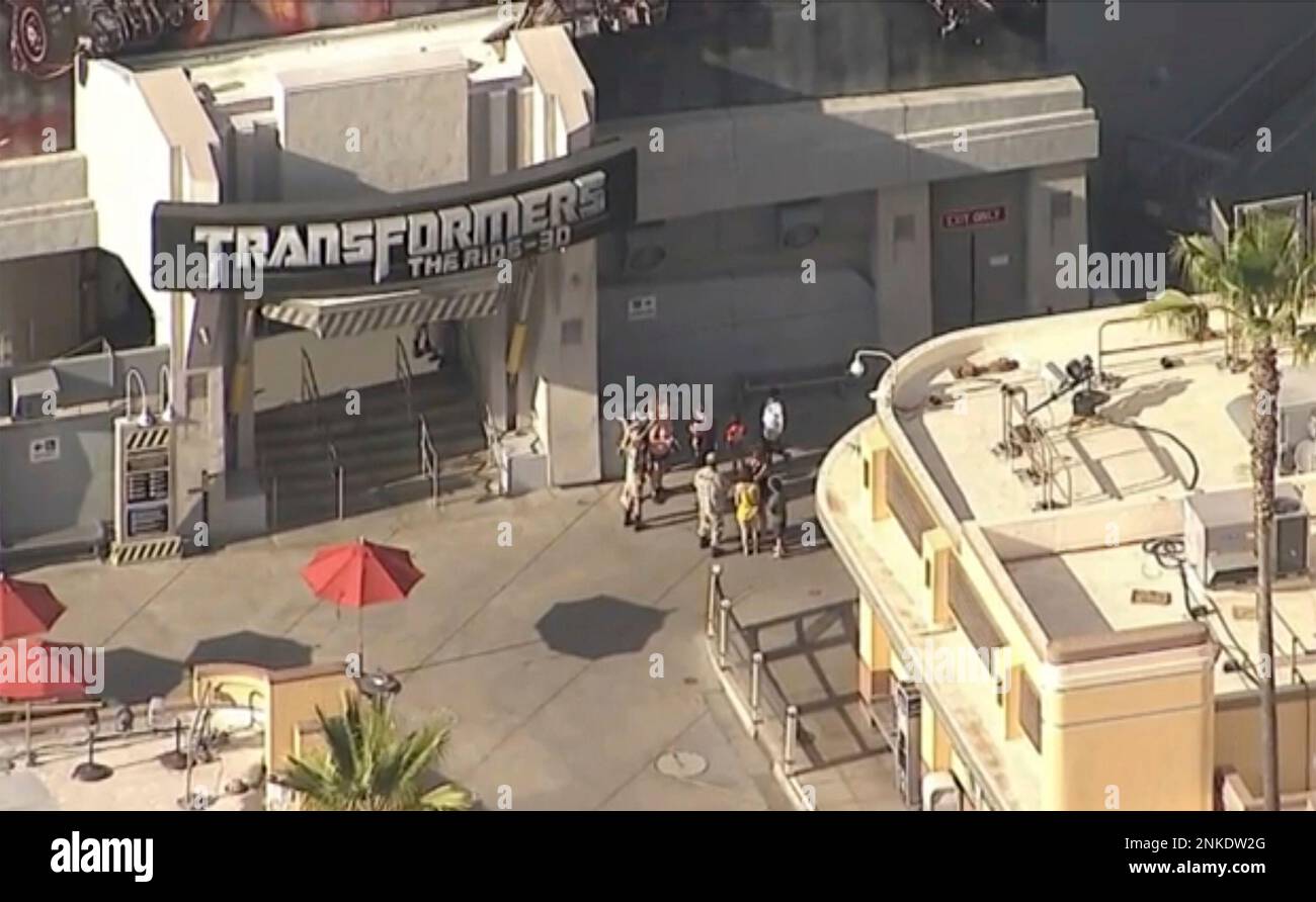 In this still image provided by ABC7 Los Angeles, people stand near the ...