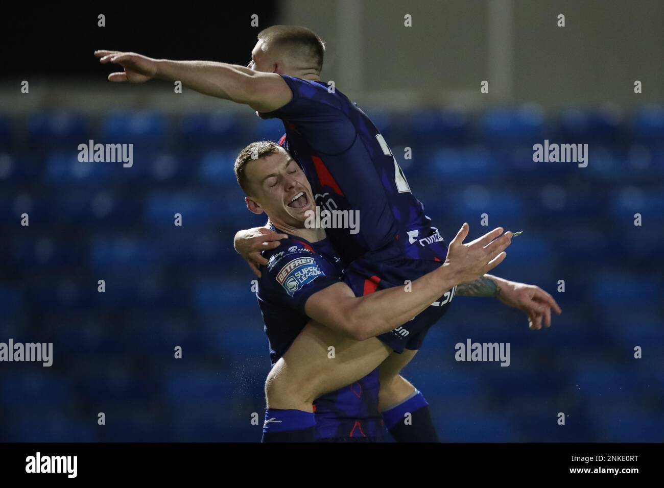 Frankie Halton #11 of Hull KR celebrates his try with Mikey Lewis #20 ...