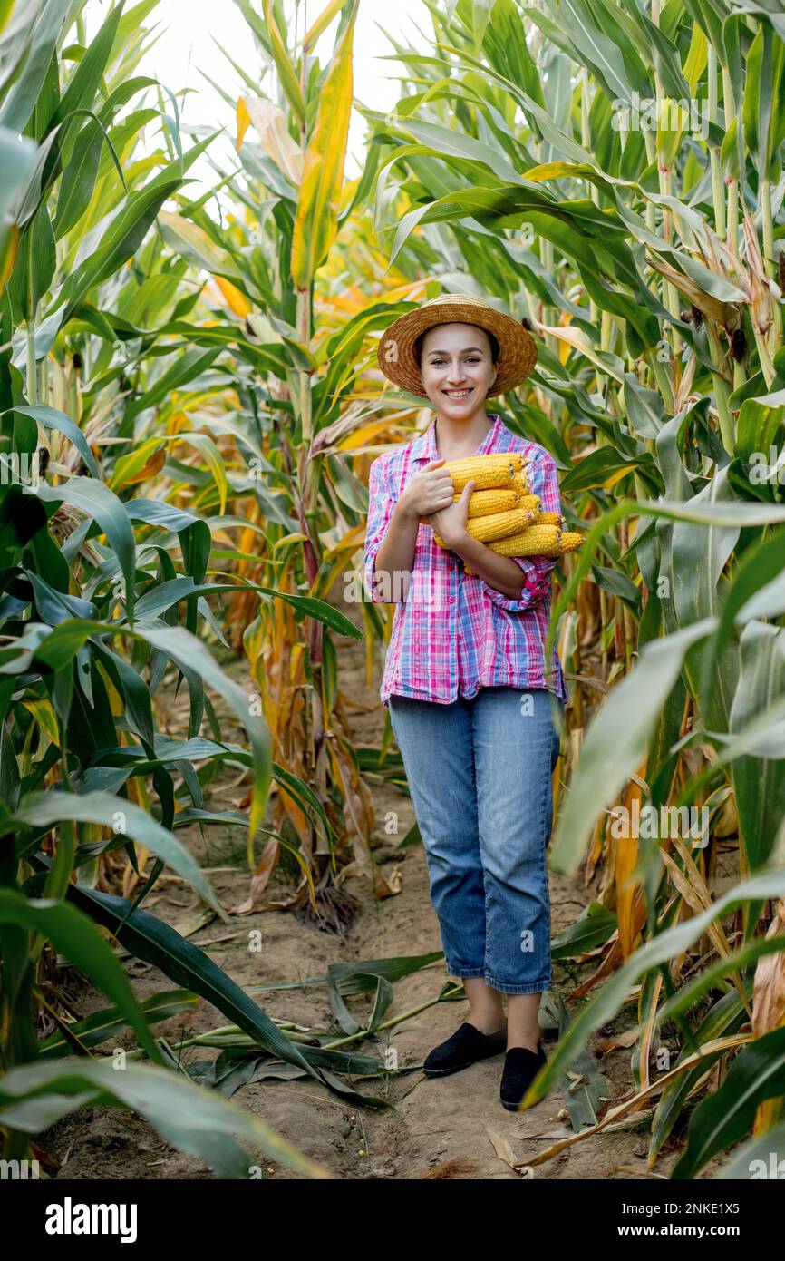 Female farmer holding cob hi-res stock photography and images - Alamy