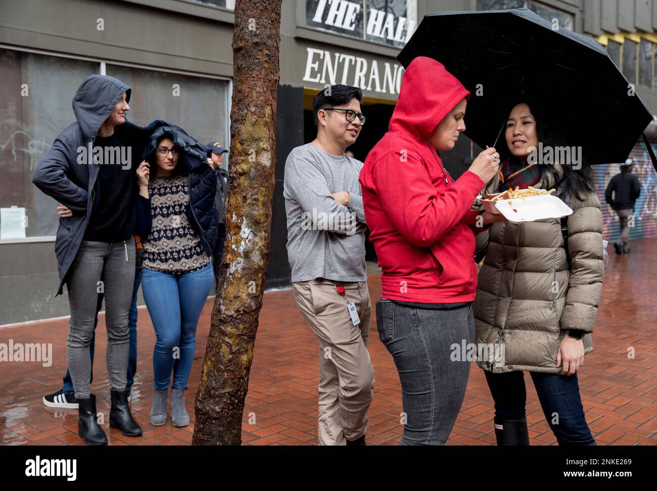 Megan Trotter (second right) eats food from Little Red Riding food ...