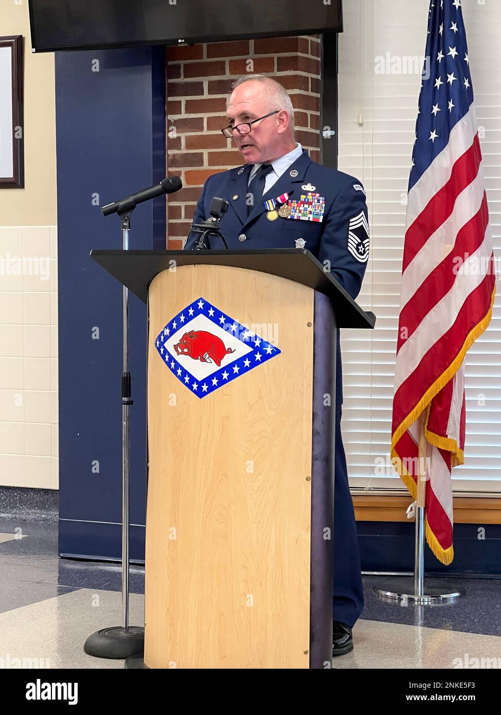Air Force Chief Master Sgt. Chad D. West address the audience at his ...