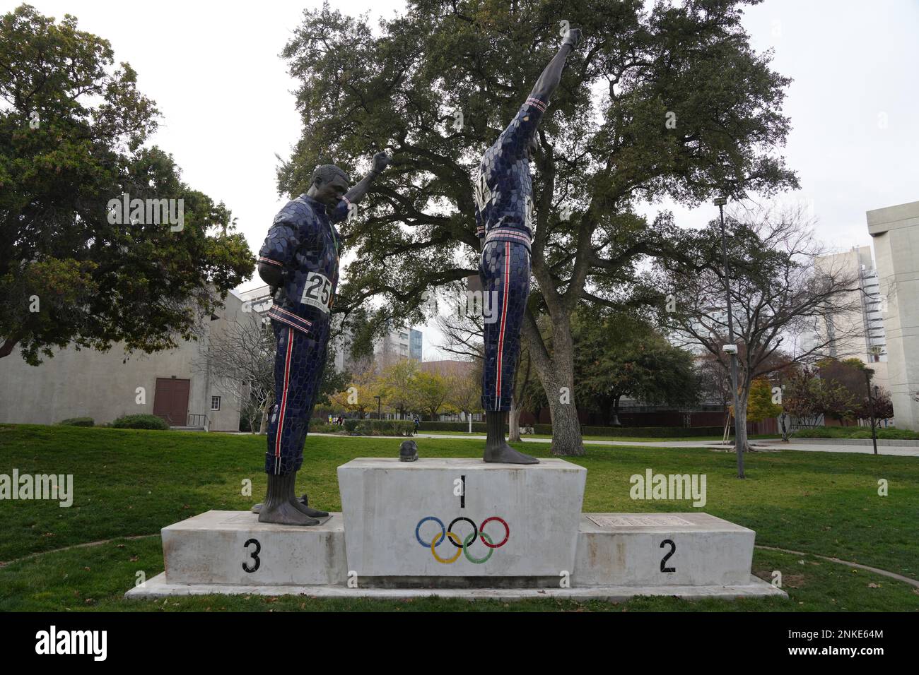 A statue sculpture depicting the 1968 Mexico City Olympics 200m medal ...