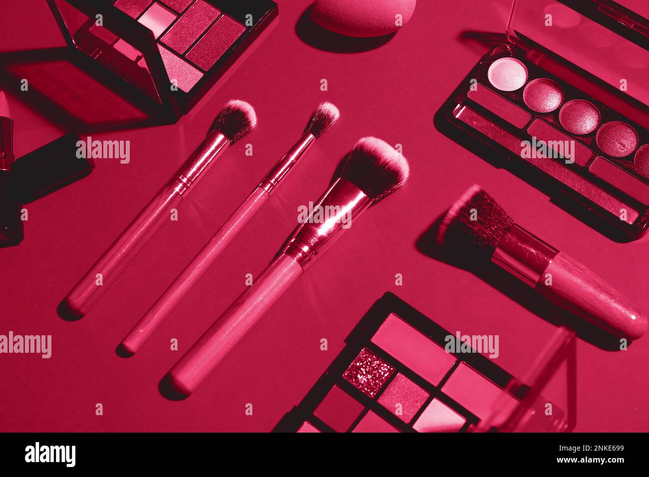 Set of makeup cosmetics in viva magenta color Stock Photo - Alamy