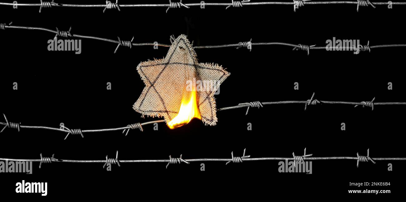 Barbed wire and burning Jewish badge on dark background. International ...