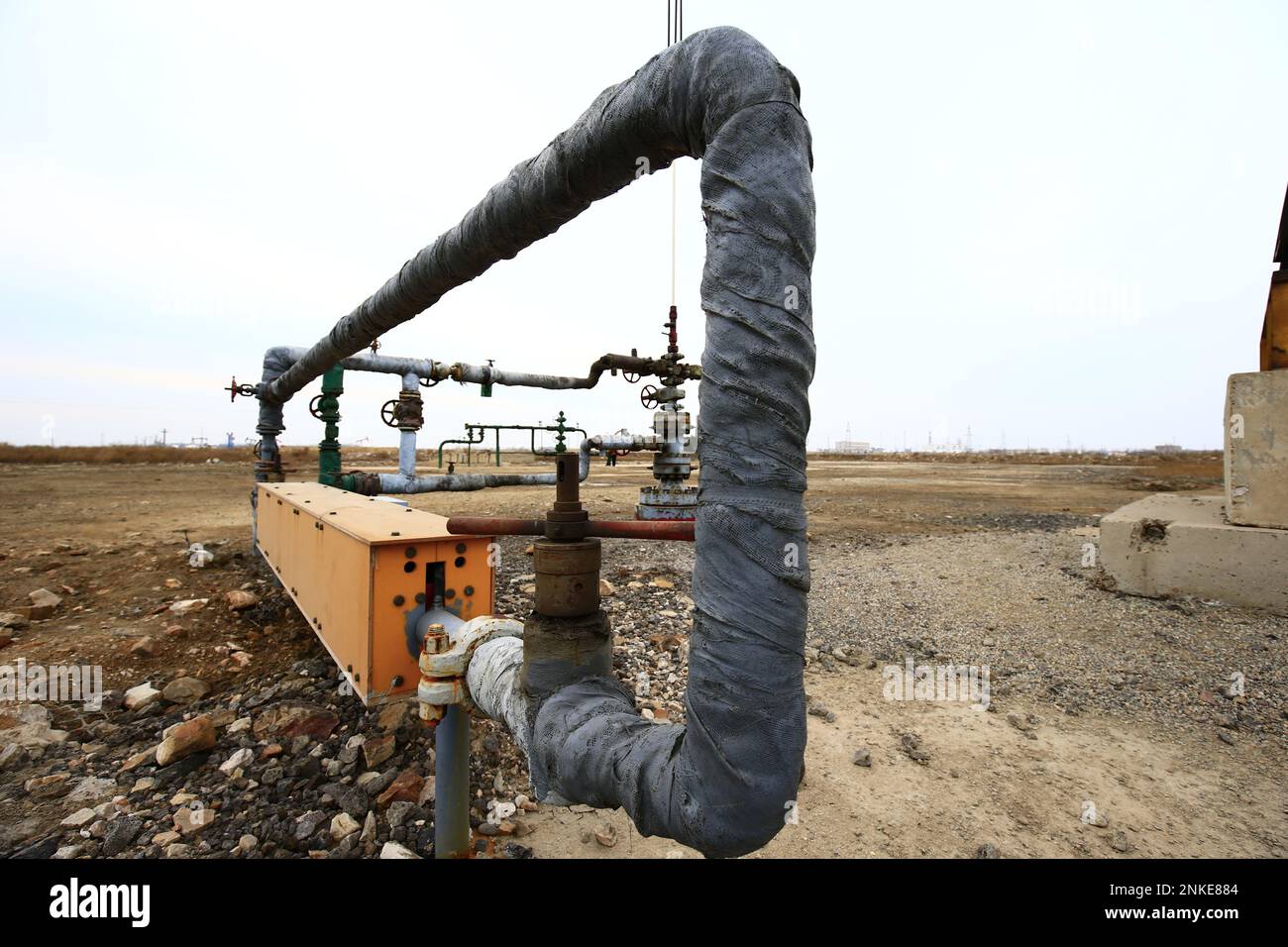 Oil pipes and valves Stock Photo - Alamy