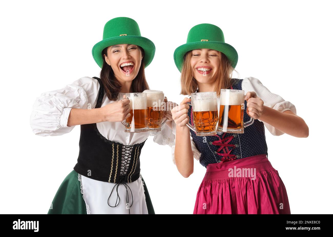 Irish waitresses with glasses of beer on white background. St. Patrick ...