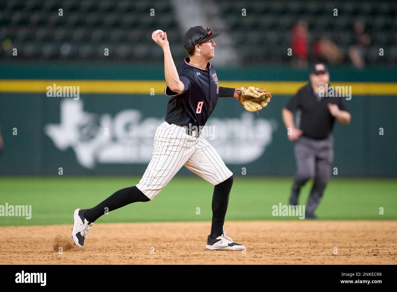 Texas Tech Red Raiders shortstop Kurt Wilson (8) throws to first base ...