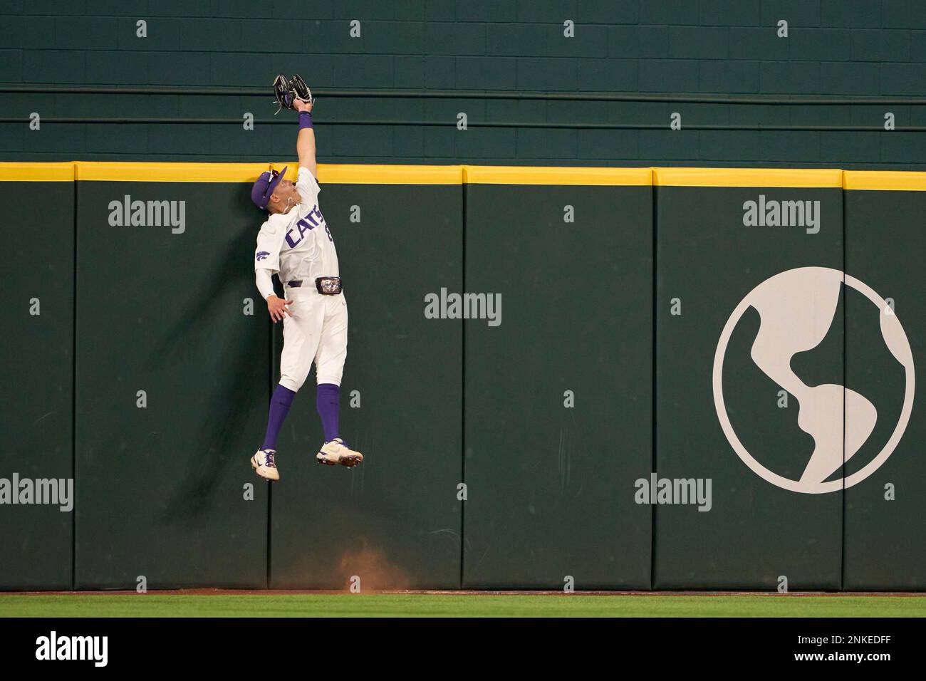 Kansas State Wildcats outfielder Cole Johnson (8) attempts to catch a ...