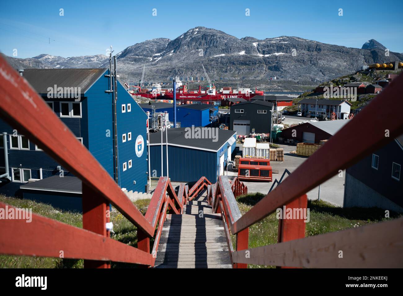 The seaport of Nuuk, Greenland, is framed from the top of a staircase ...