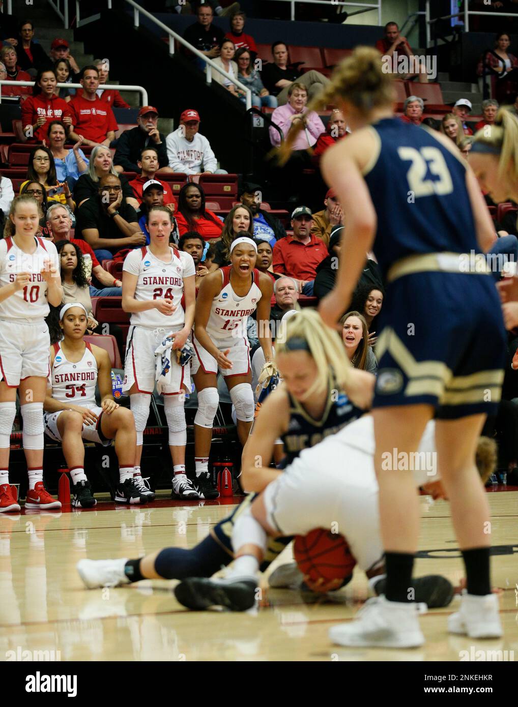 The Stanford Cardinal and the UC Davis Aggies go for the loose ball ...