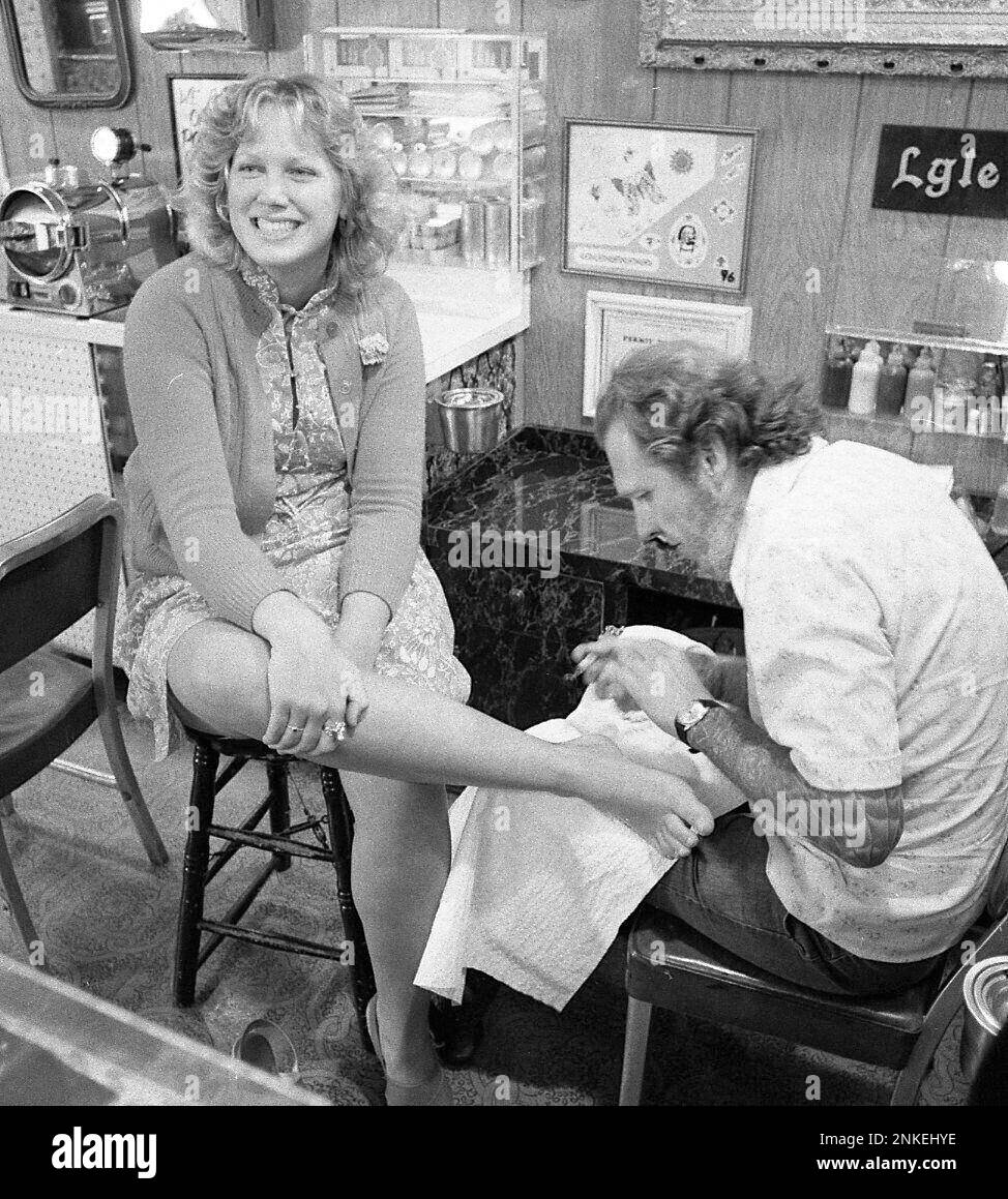 Tattoo artist Lyle Tuttle, at work in his studio, July 23, 1976 (Bill ...