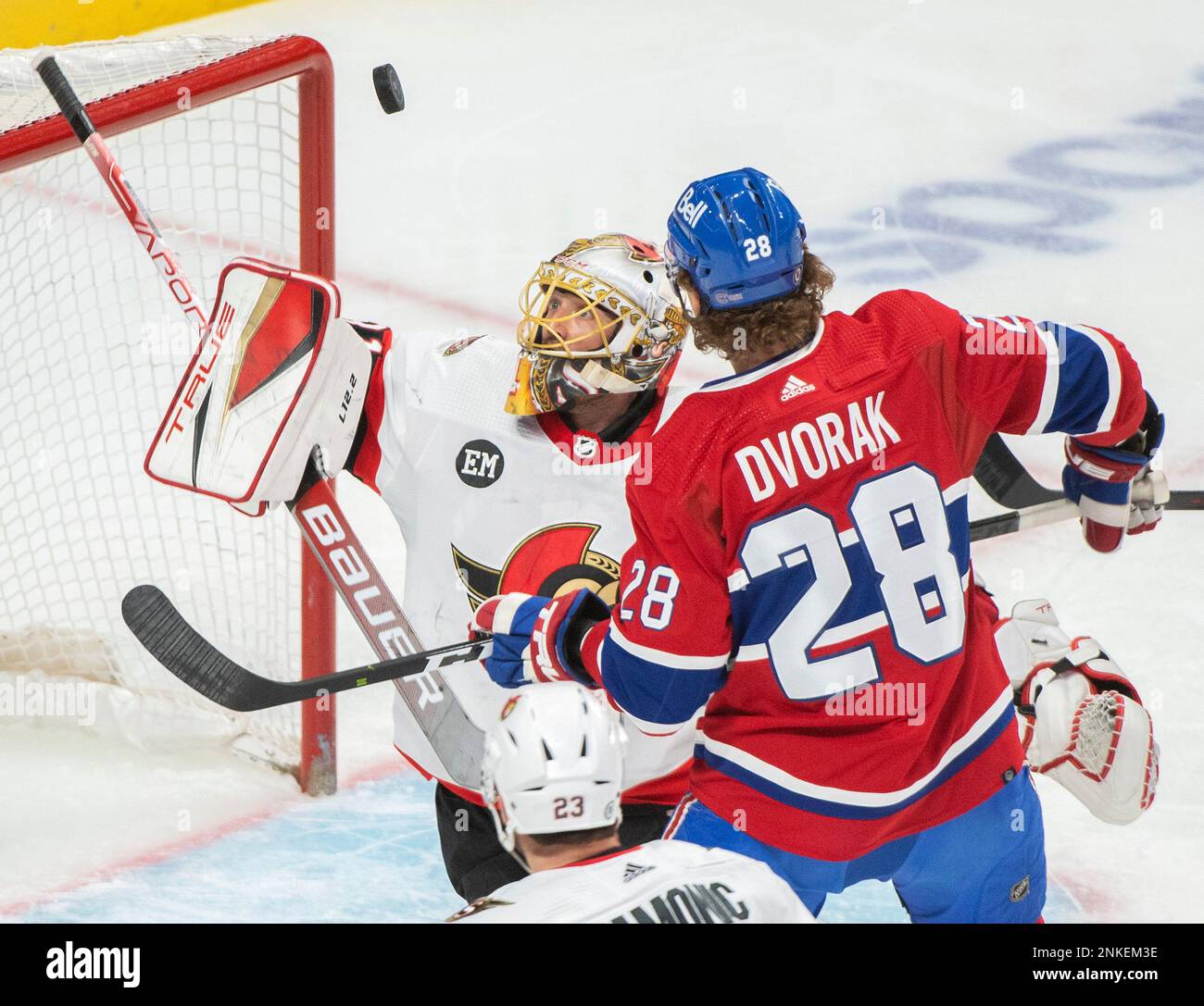 Montreal Canadiens' Christian Dvorak (28) moves in as Ottawa Senators ...