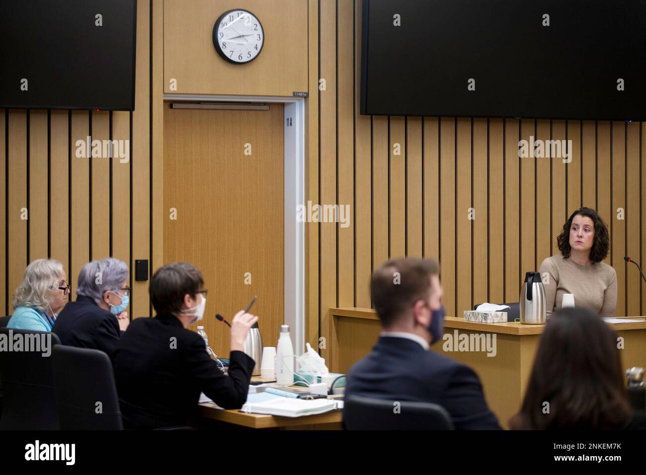 Witness Kathleen Dooley, at right, testifies at the murder trial of ...