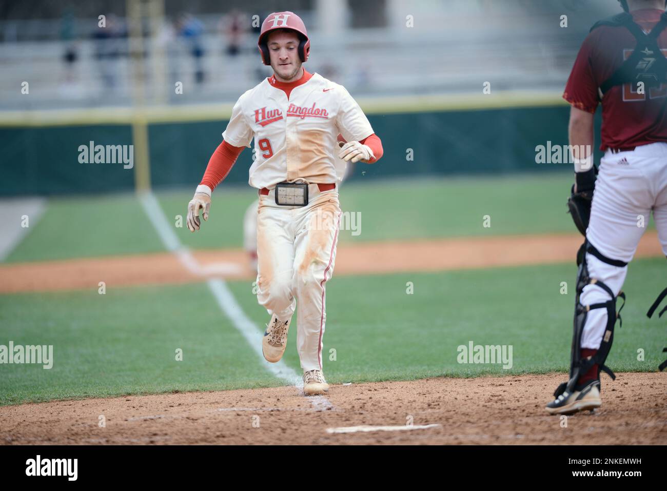 Huntingdon Hawks' Ryan Greene (9) scores from third in the Hawks' 10-2 ...