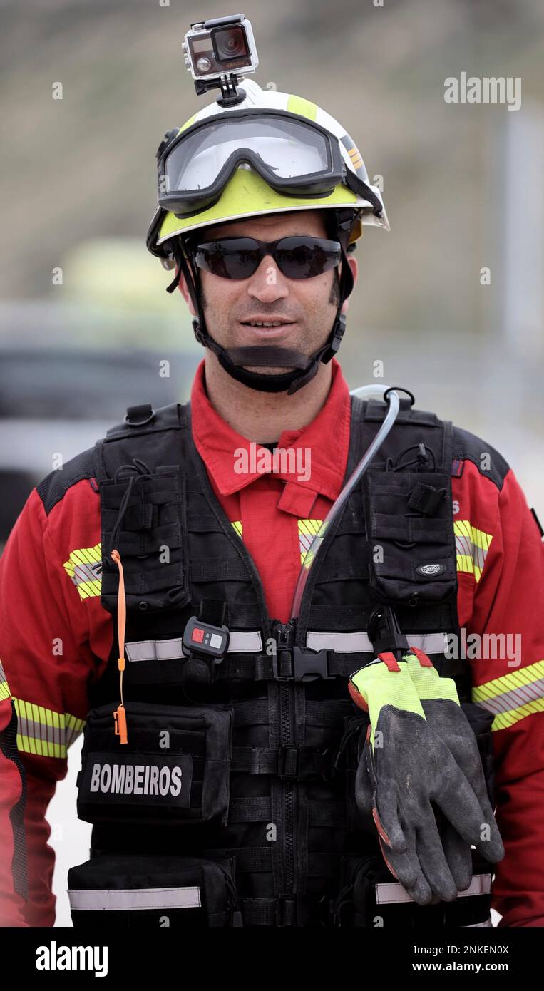 A firefighter from Portugal participates in a drill at the national ...