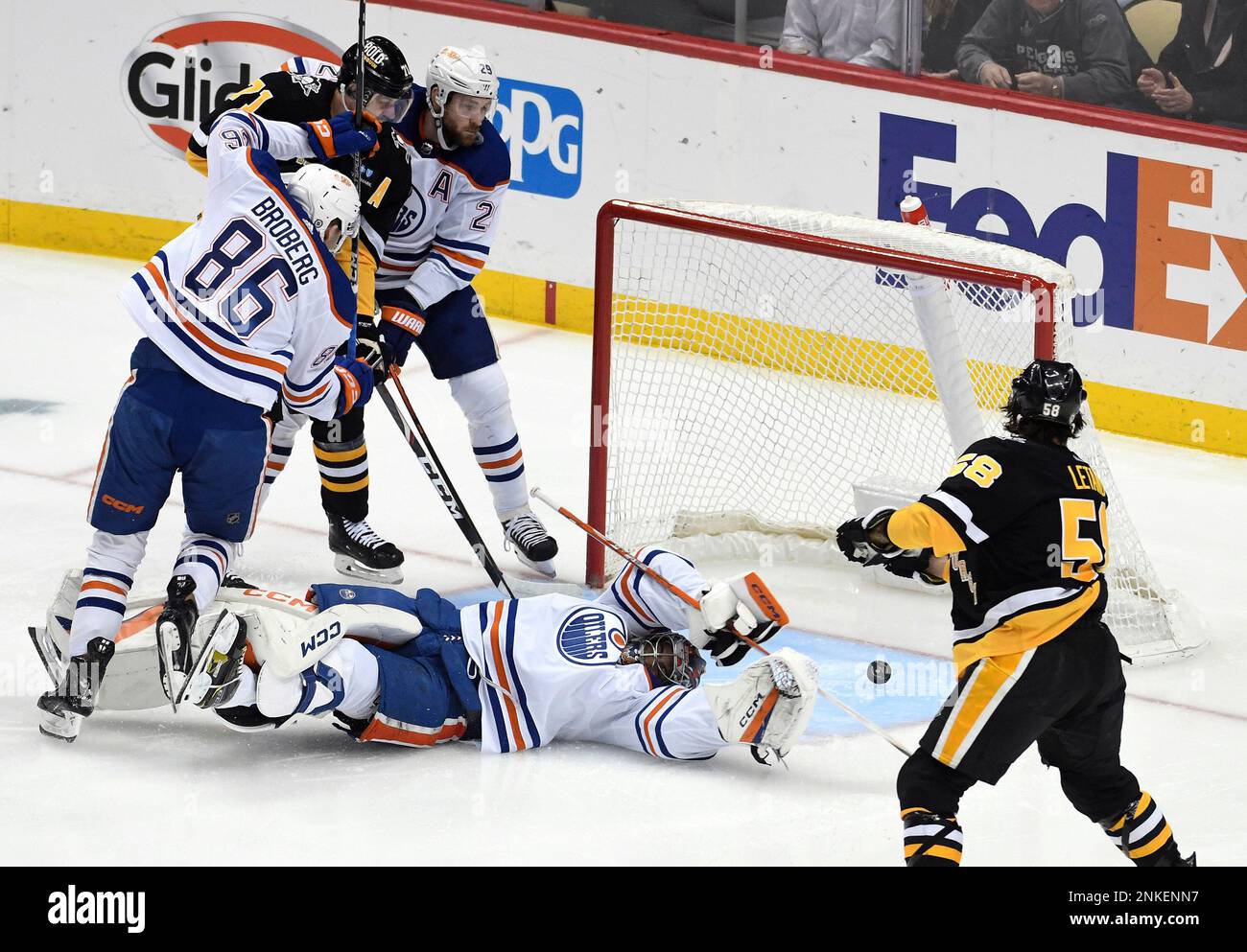 Pittsburgh Penguins defenseman Kris Letang (58) shoots and scores on ...