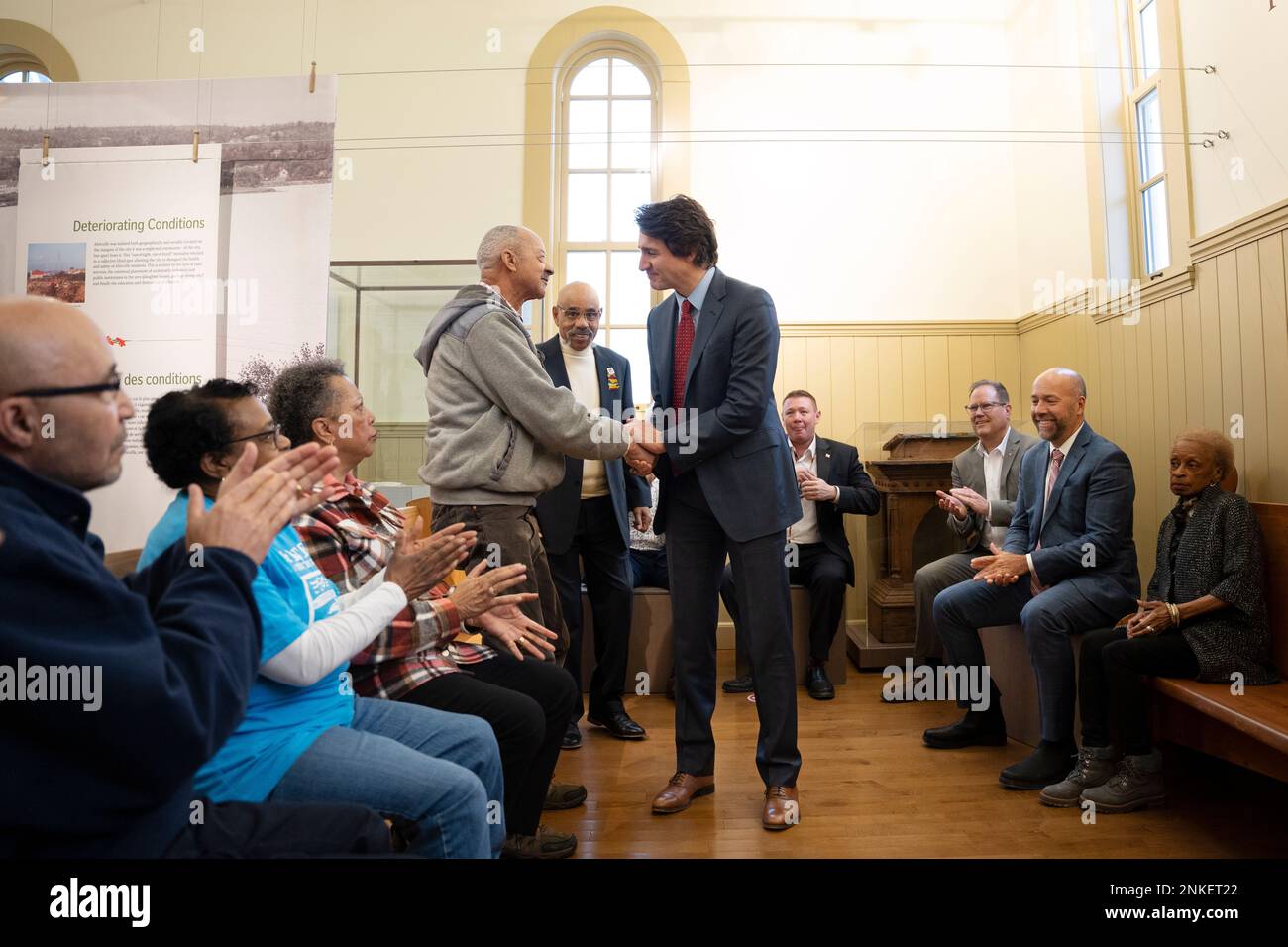 Prime Minister Justin Trudeau, centre, meets with community members at ...
